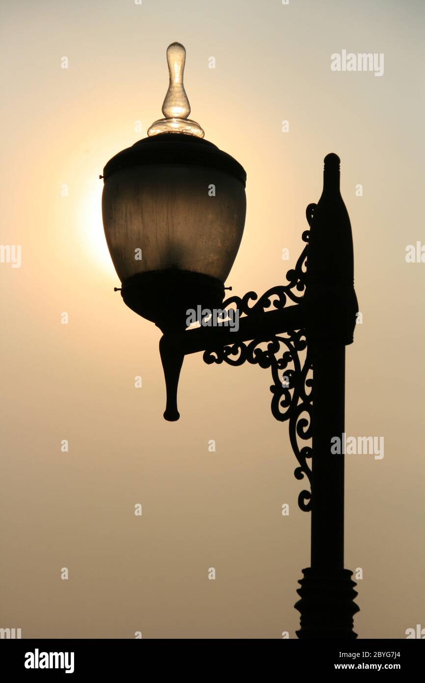 lamp post with sun Stock Photo - Alamy