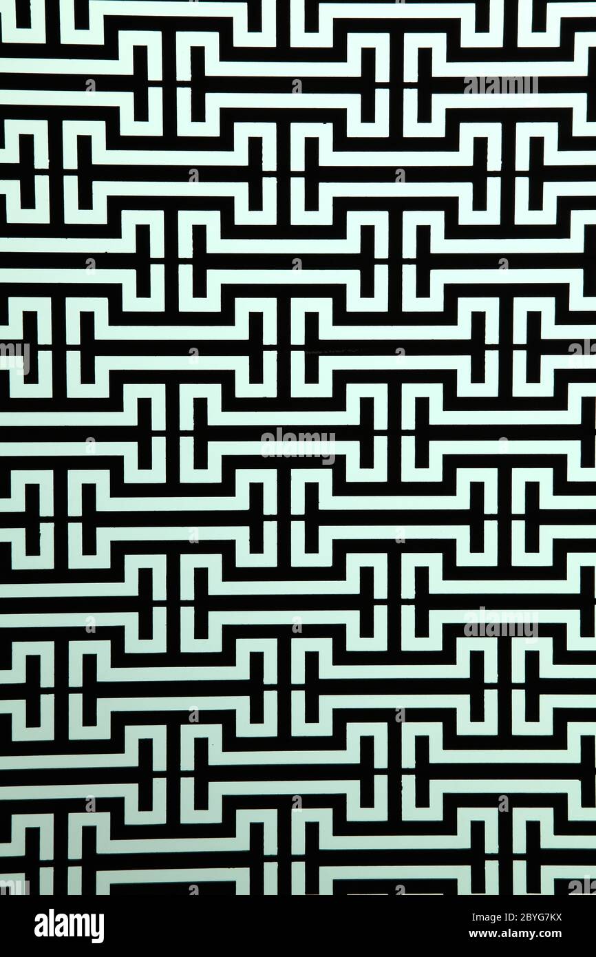 widows steel rod pattern on light blue, close up Stock Photo - Alamy