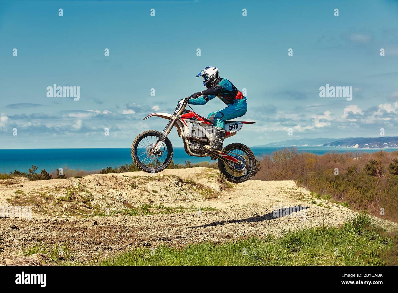 Extreme concept, challenge yourself. Extreme jump on a motorcycle on a ...