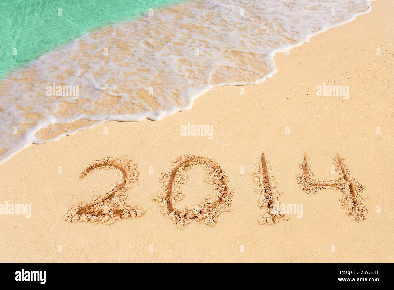 Numbers 2014 on beach Stock Photo - Alamy