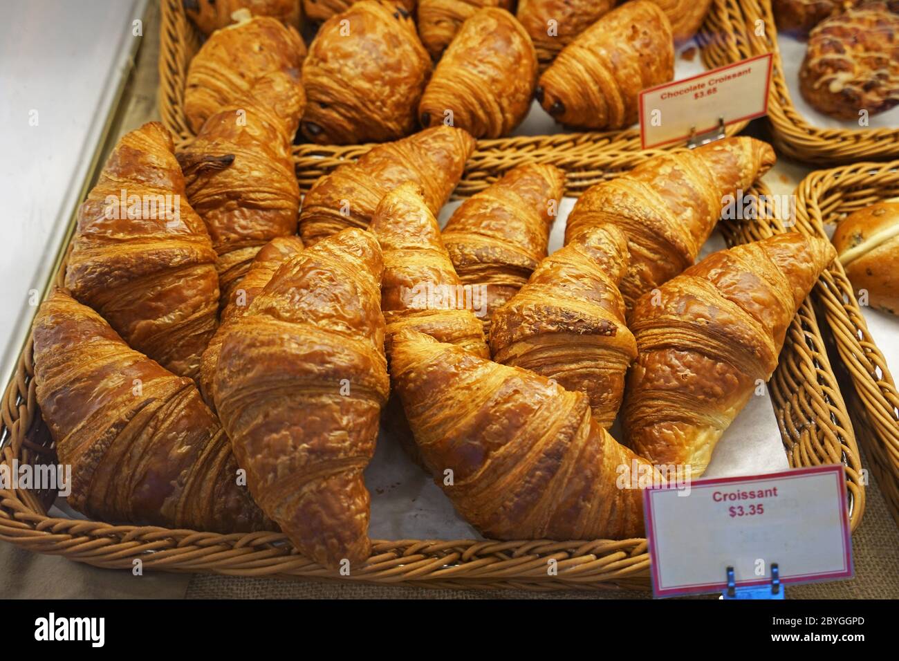 Close up basket of plain butter croissant in display showcase box Stock ...