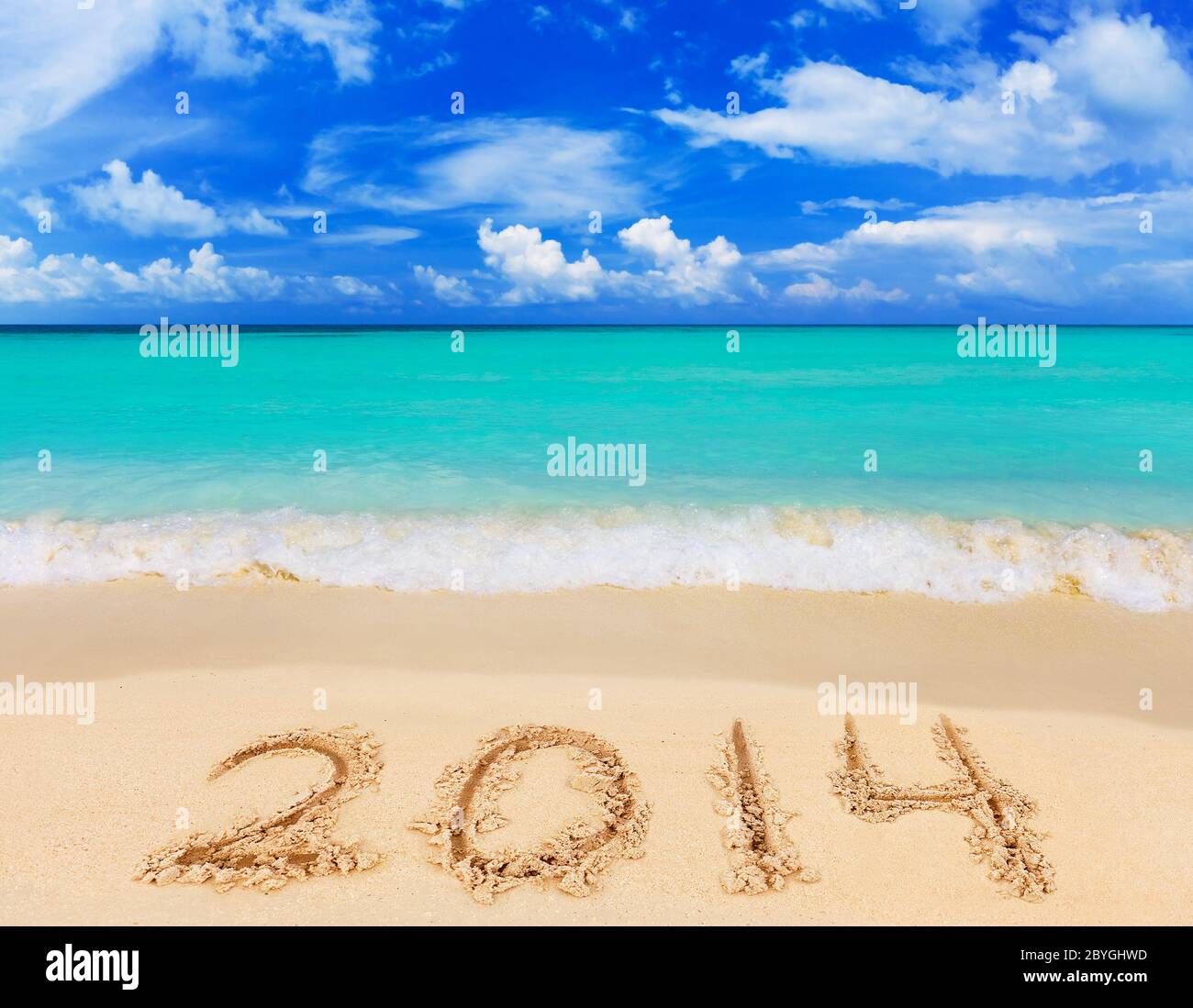 Numbers 2014 on beach hi-res stock photography and images - Alamy