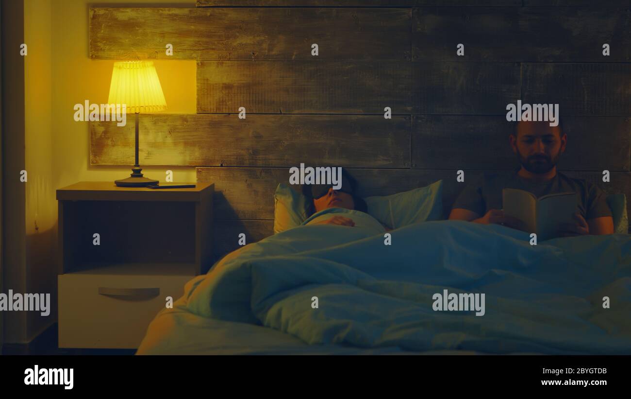 Man turning off smart lamp hi-res stock photography and images - Alamy