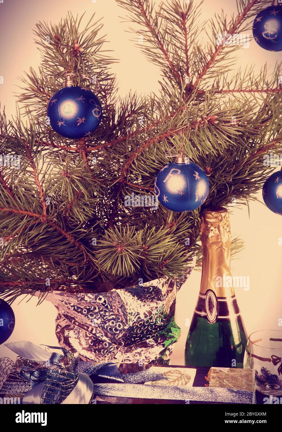 still life with New Year's balls and sparkling win Stock Photo - Alamy