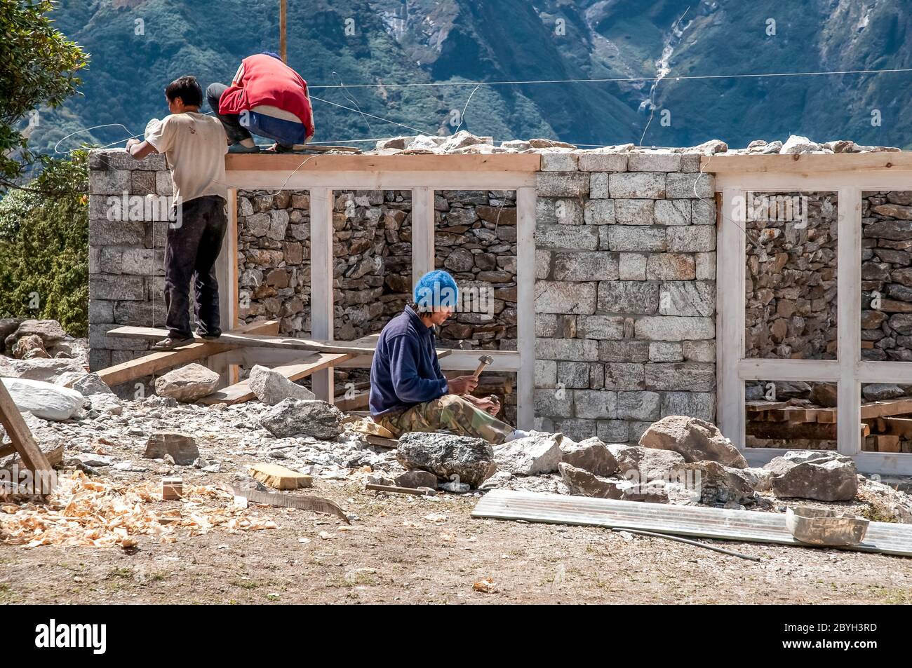 Nepal. Island Peak Trek. Colourful street scenes at a construction site ...