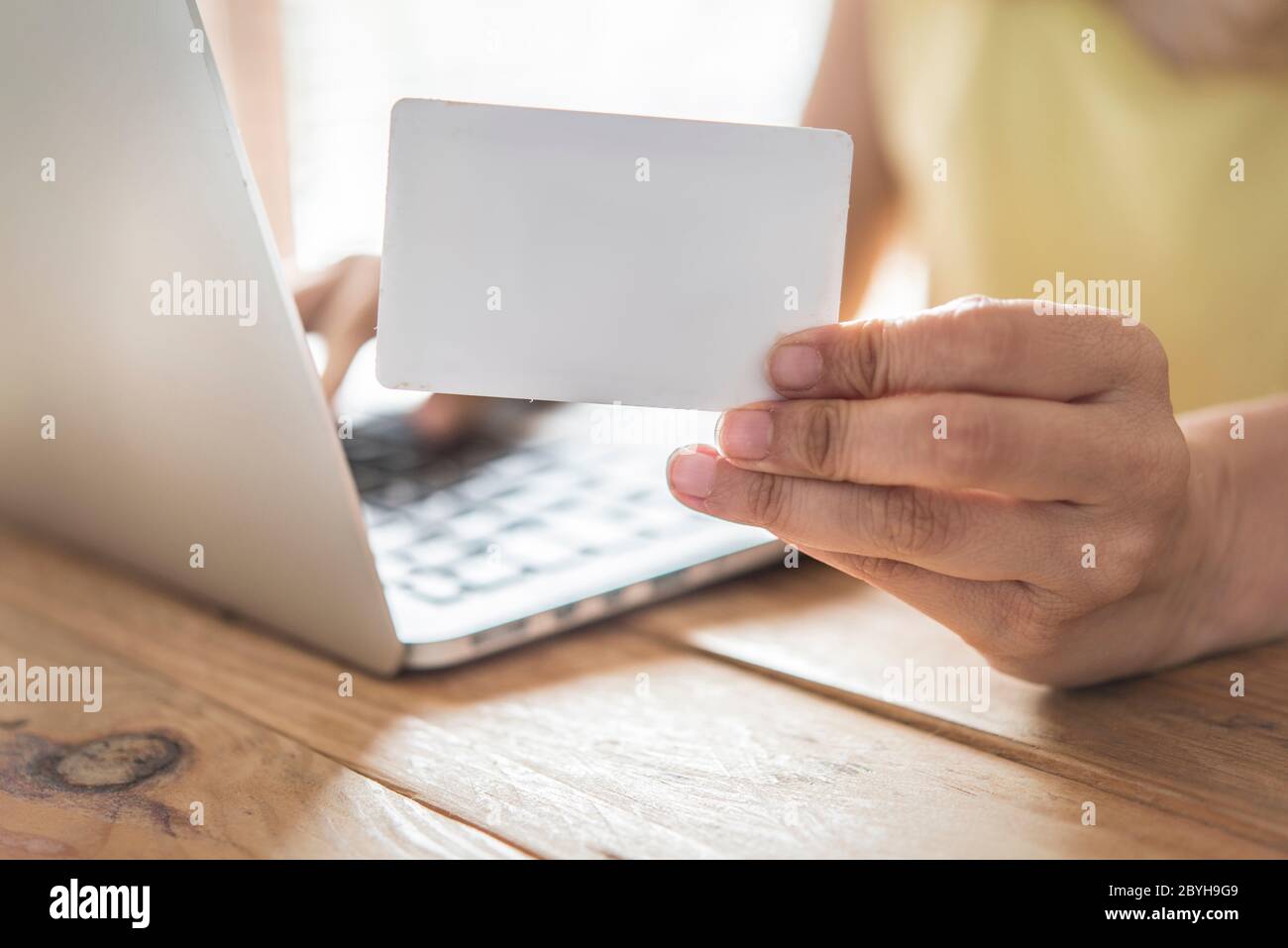 Top view of man using credit card for online shoping Stock Photo - Alamy