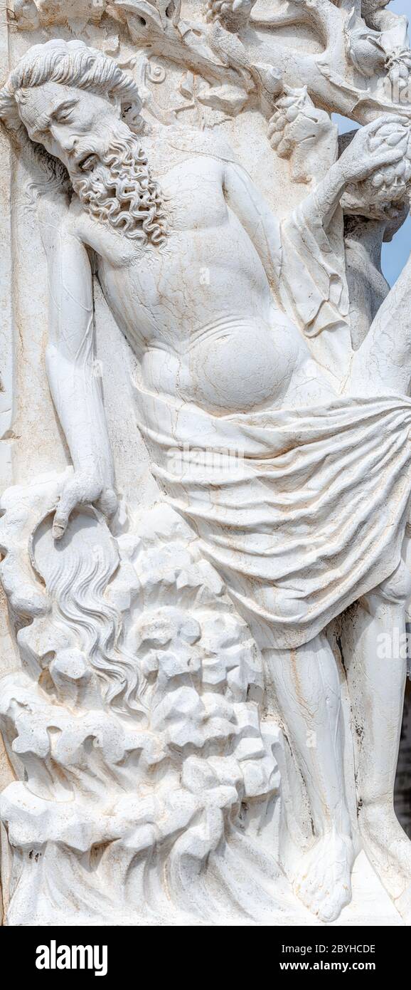 Ancient aged sculpture of a saint Biblical personage, bearded elder man ...