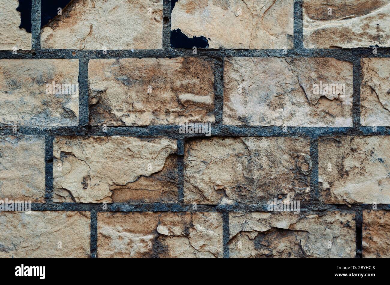 Texture of an old brick wall. The outer wall of a very old building ...