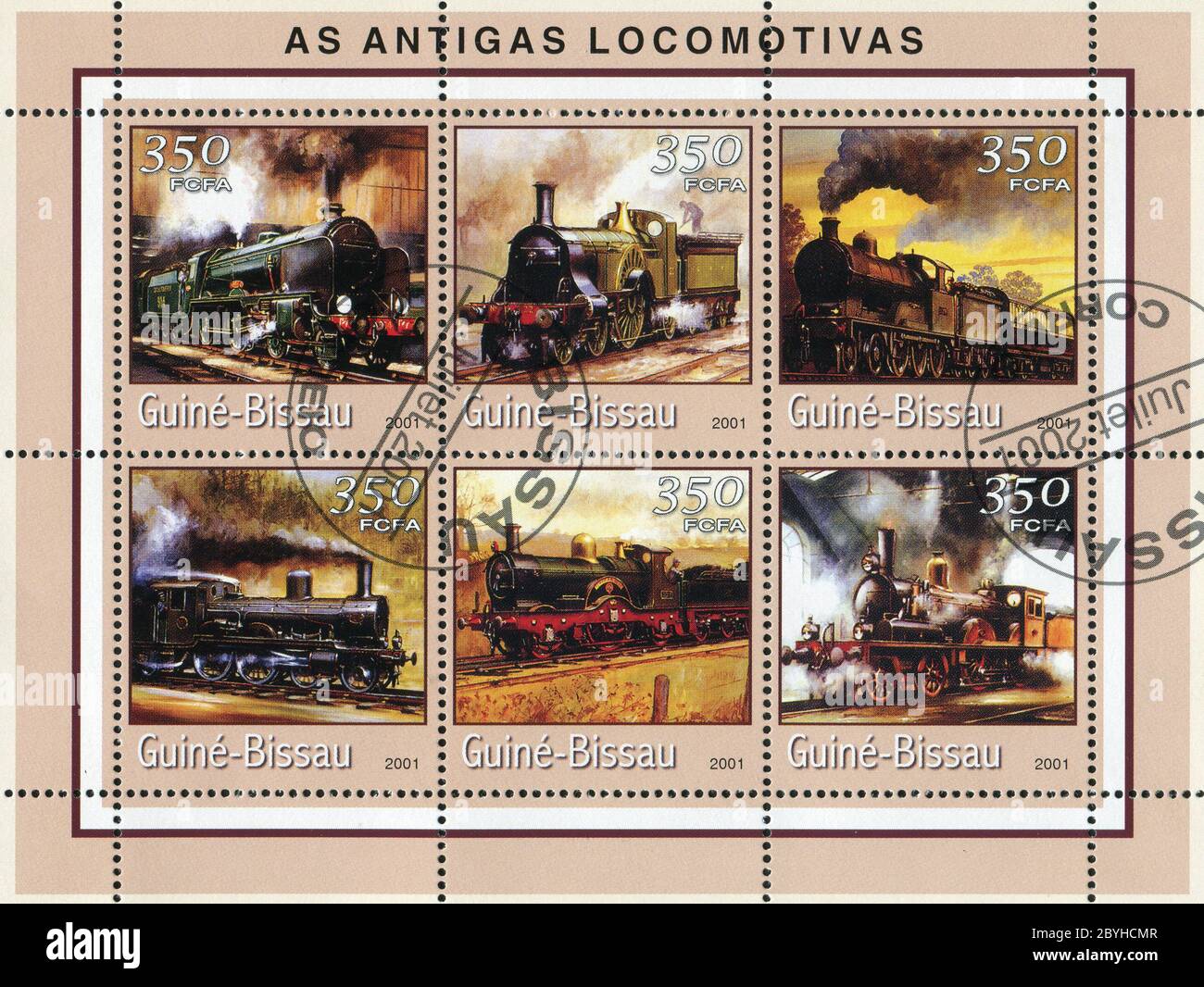 GUINEA-BISSAU - CIRCA 2001: Ancient train with a steam locomotive ...