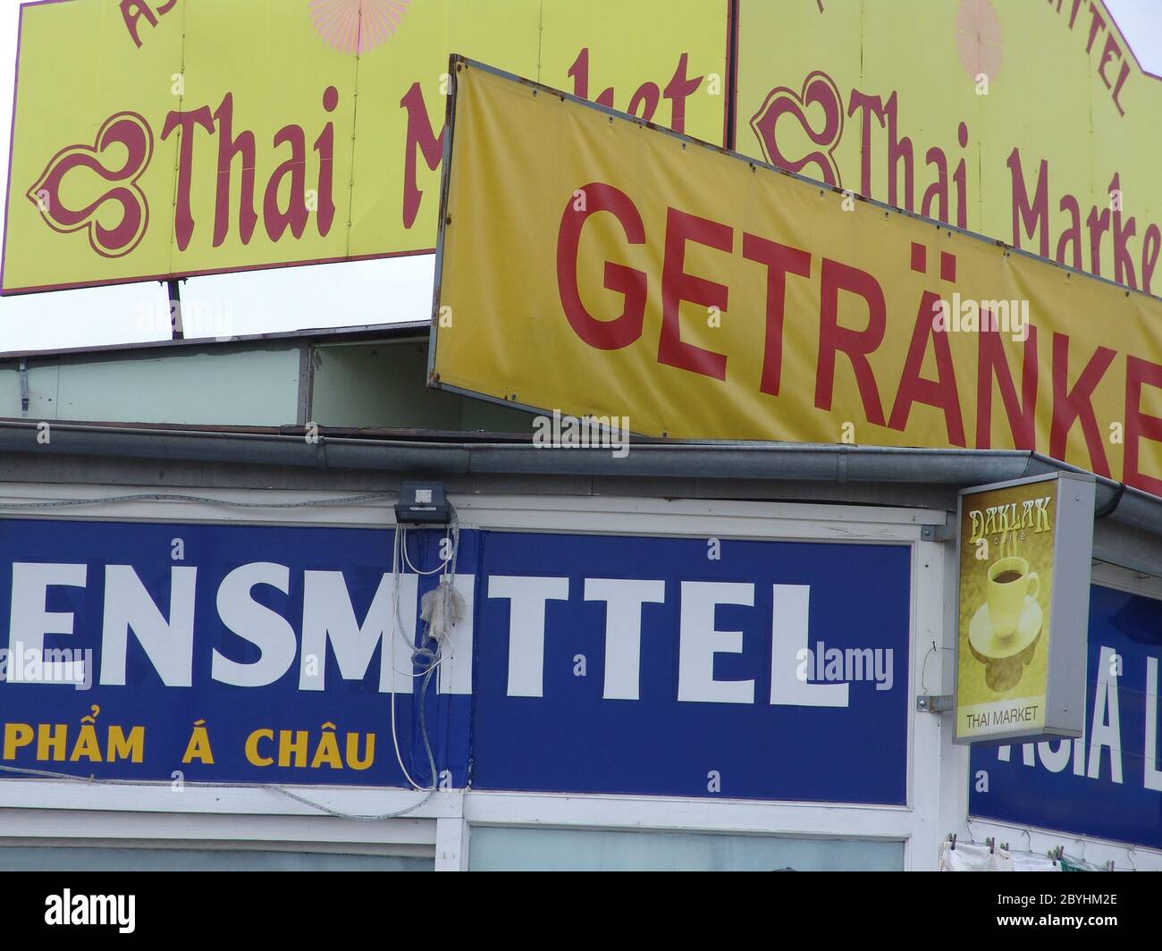 Signs on Vietnamese market Stock Photo - Alamy