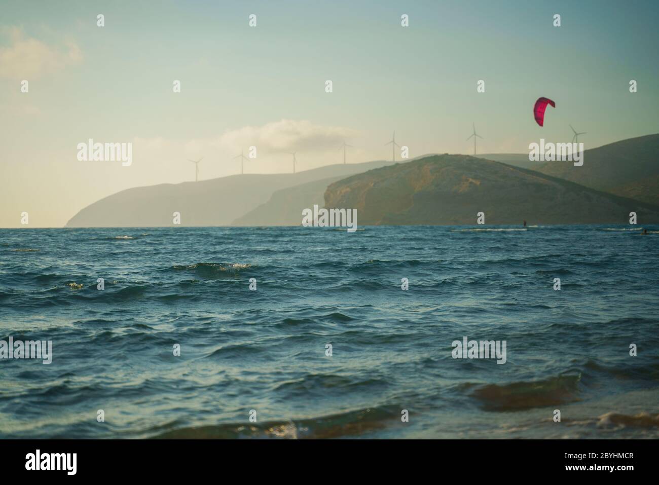 Kitesurfer riding on the waves at Prasonisi kite beach at Rhodes island ...
