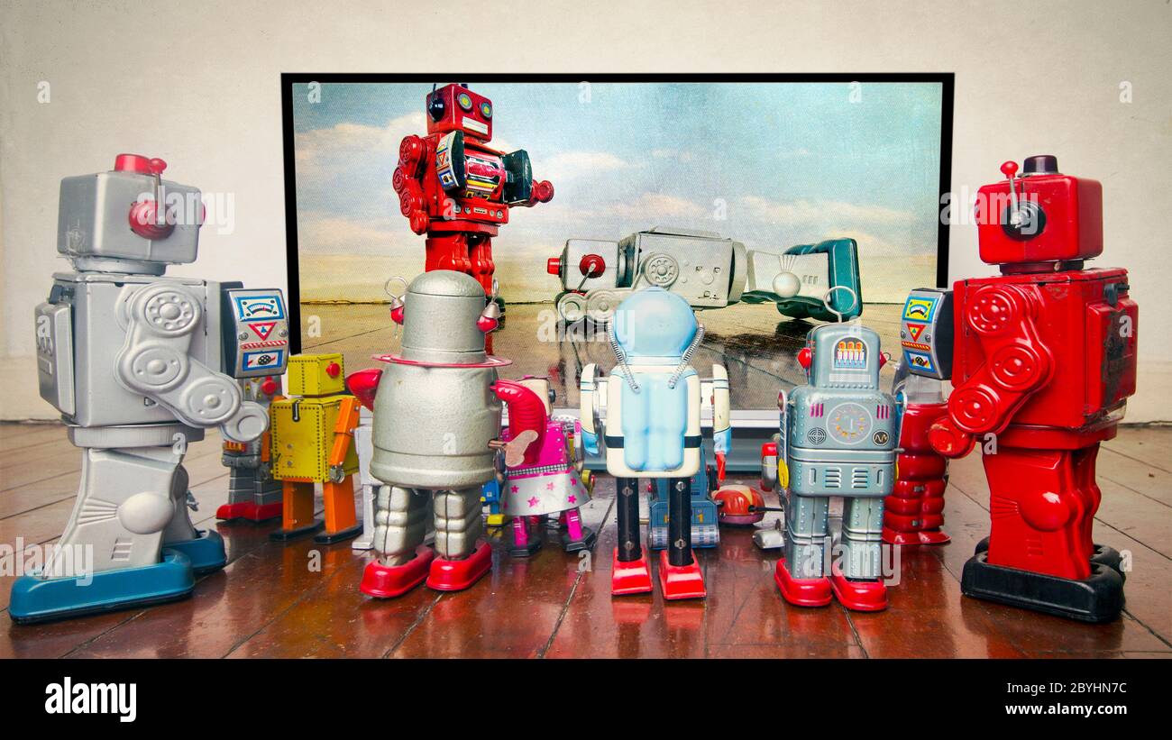 retro robots watch the TV News police brutality Stock Photo - Alamy