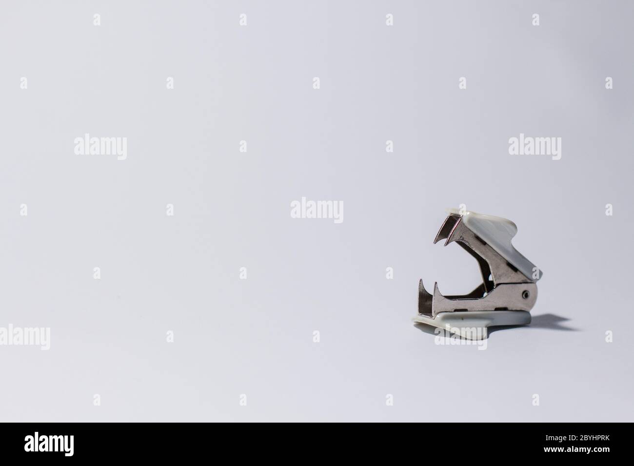 an anti-stapler on a white background Stock Photo - Alamy