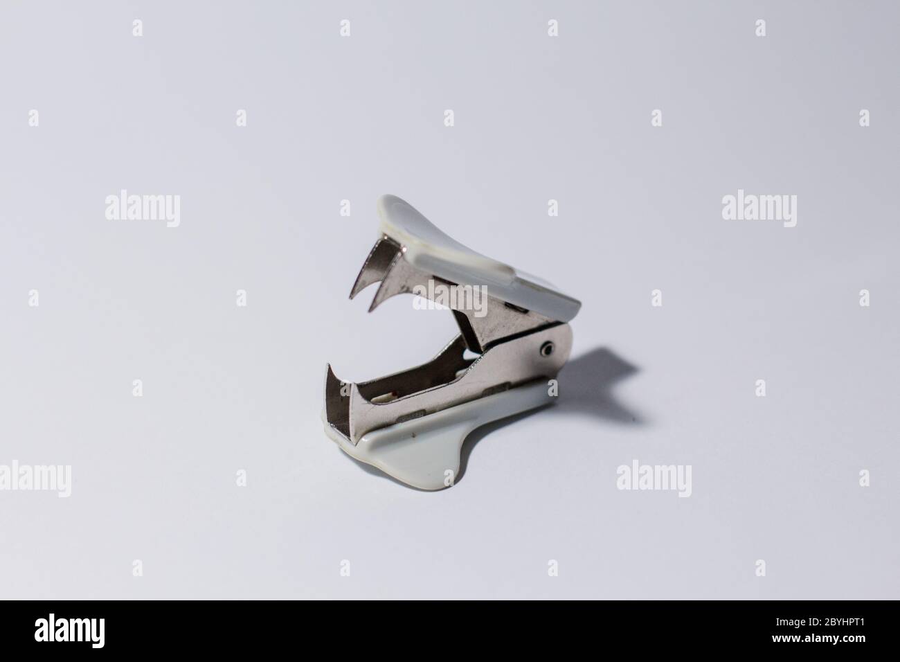 an anti-stapler on a white background Stock Photo - Alamy