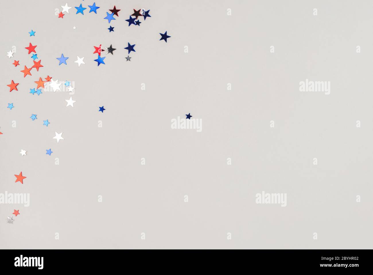 Festive background with confetti in the color of the American flag ...
