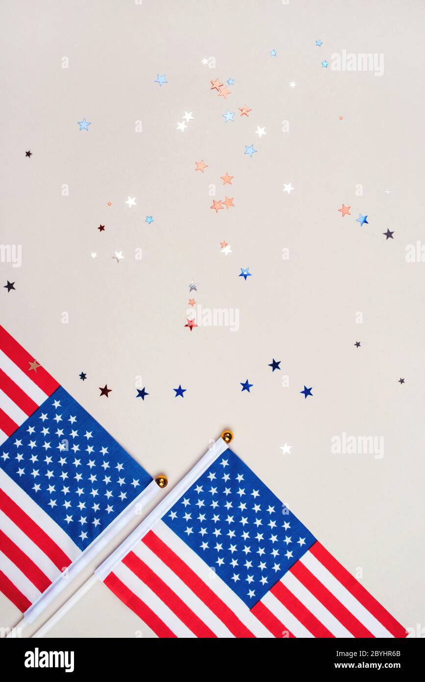 Festive background with US flags and confetti Stock Photo - Alamy