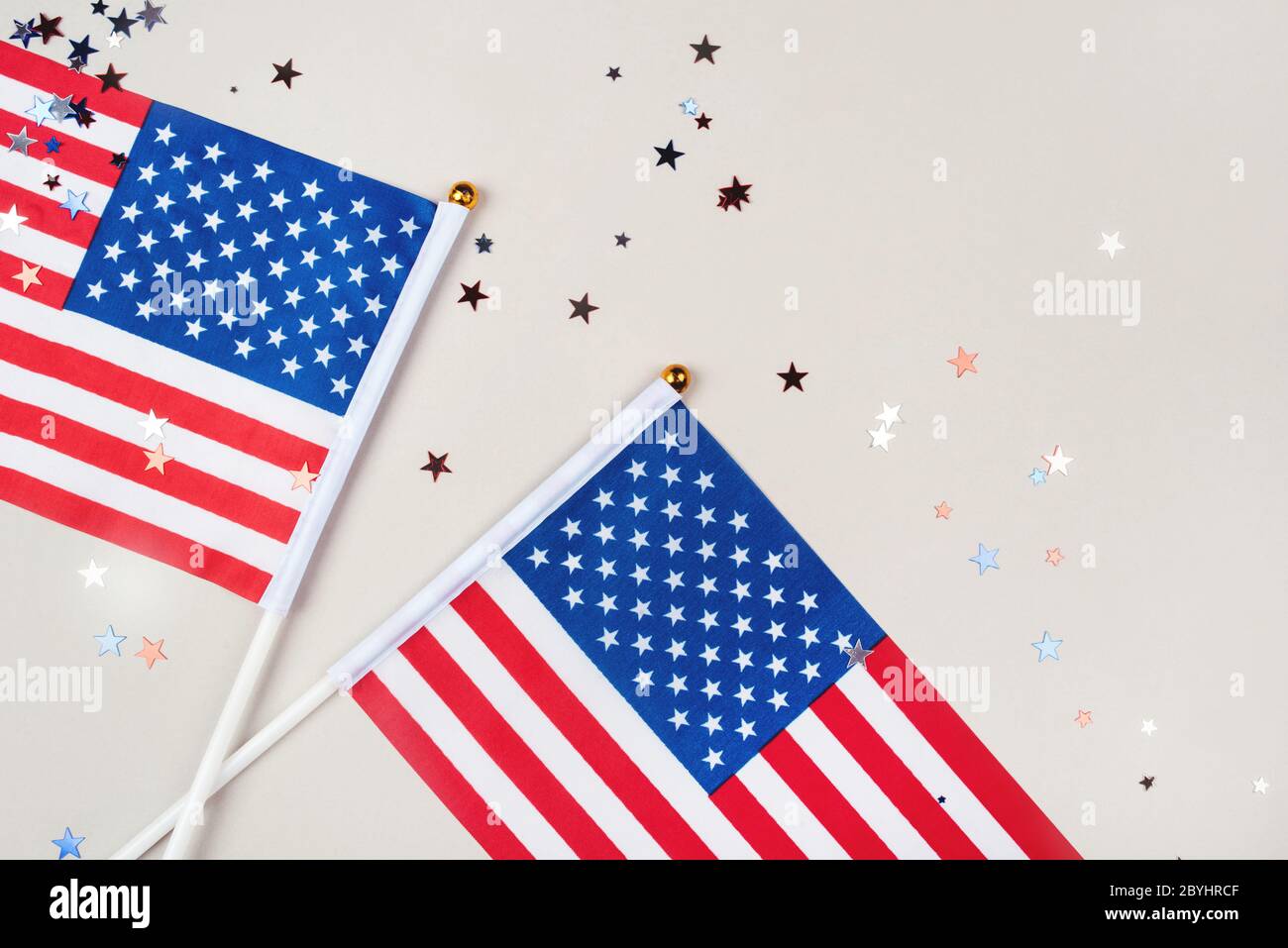 Festive background with US flags and confetti Stock Photo - Alamy