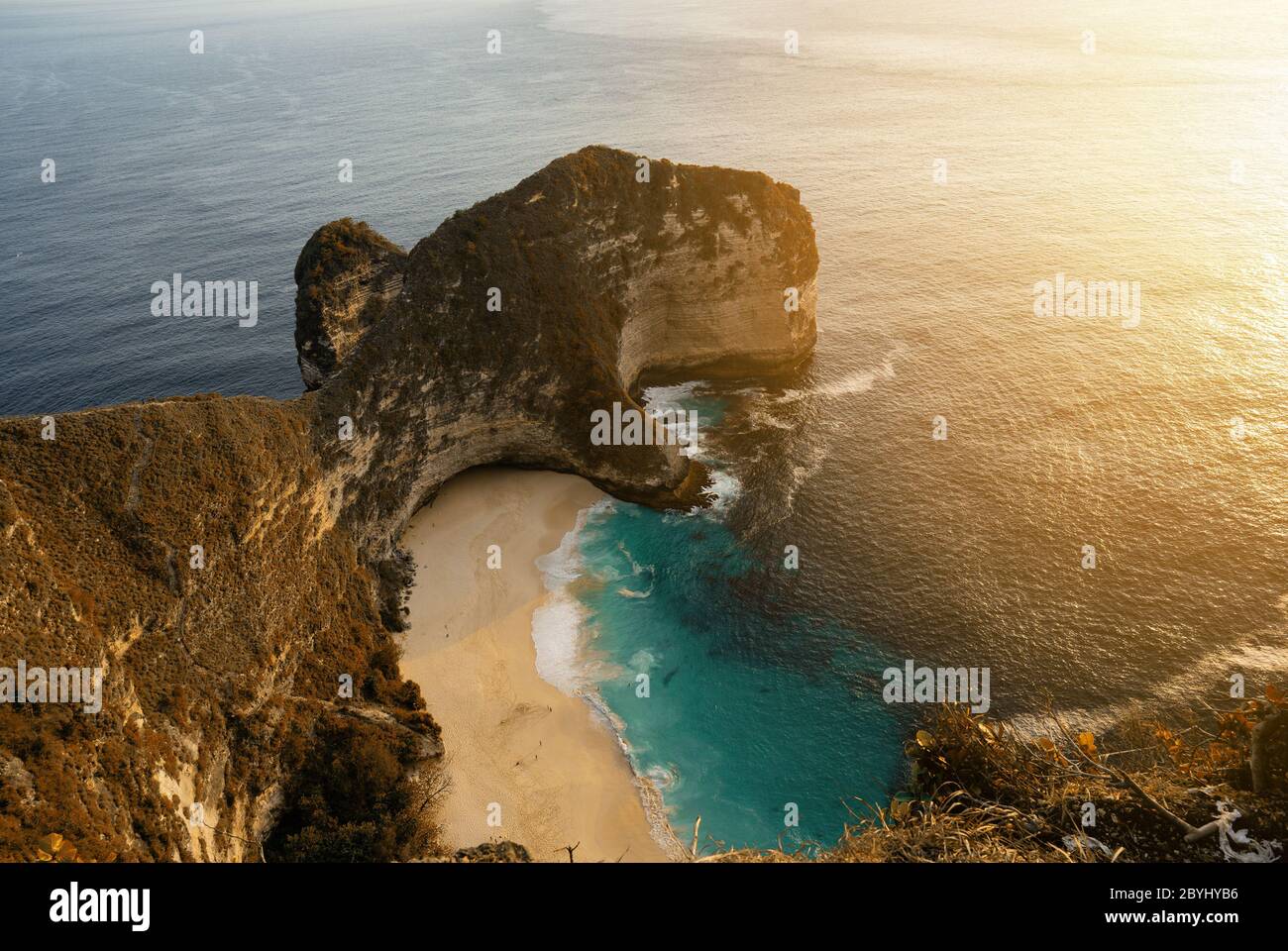View of Kelingking beach at sunset from the upper vantage point or t ...