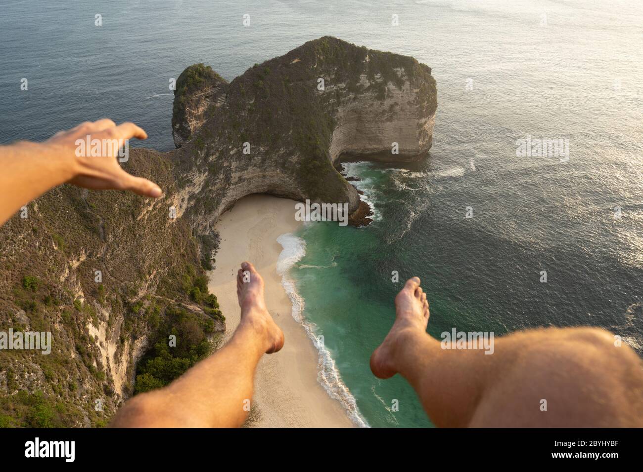 View of Kelingking beach at sunset from the upper vantage point or t ...