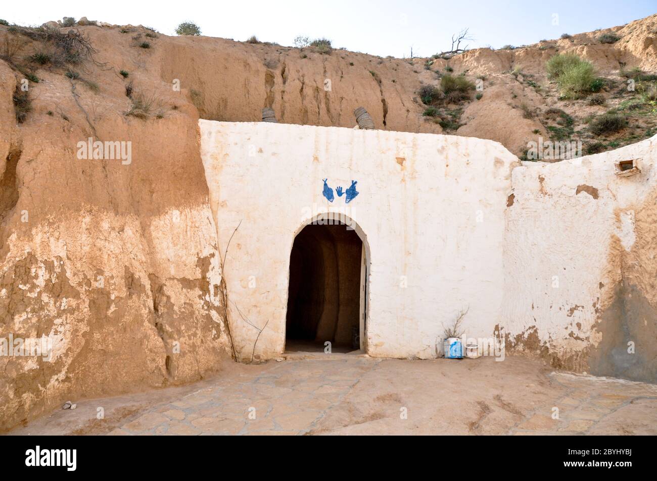 MATMATA, TUNISIA - February 03, 2009: Picture of a hand and fish symbol ...