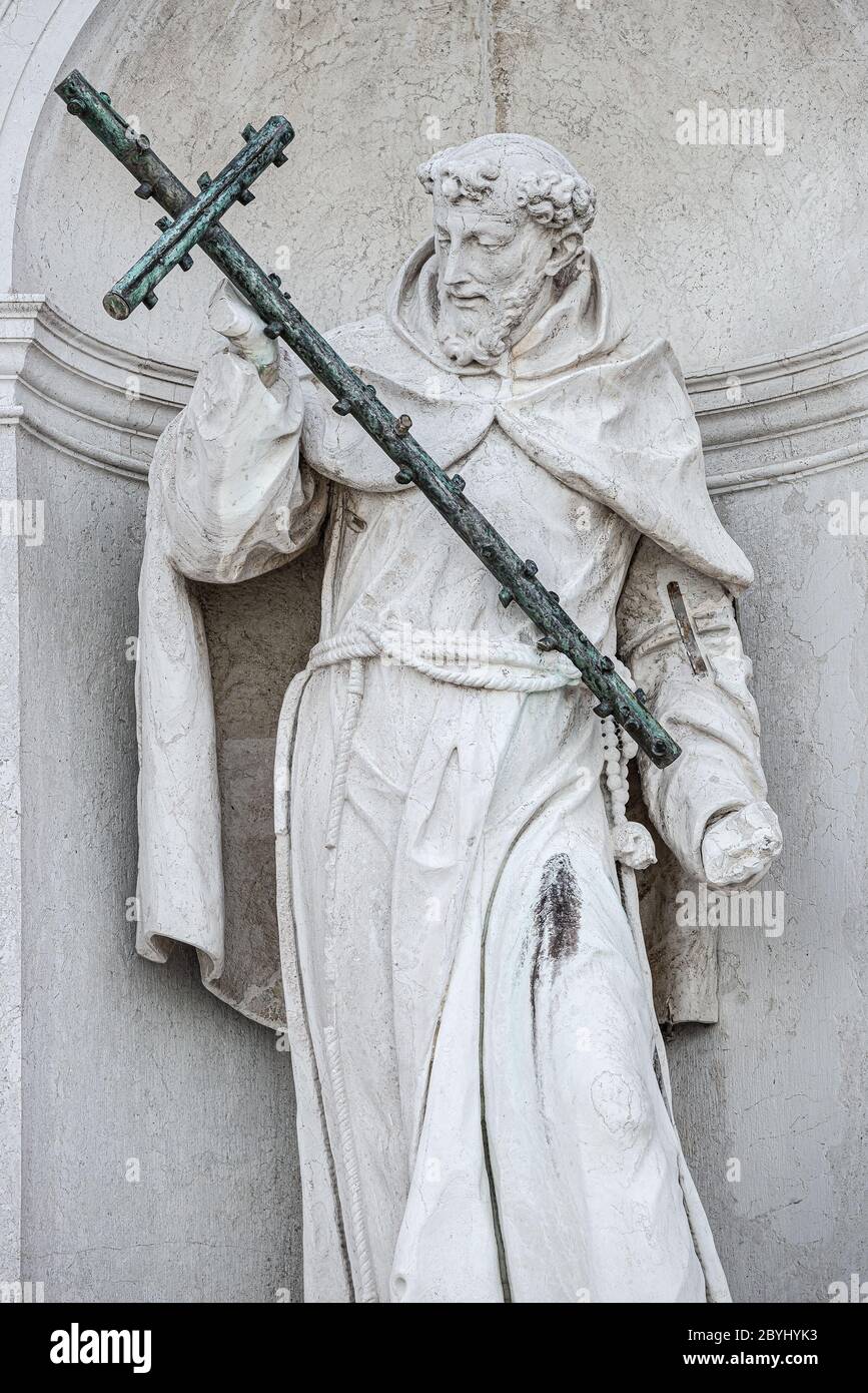 Saint George statue with big cross at the facade of Church of San ...