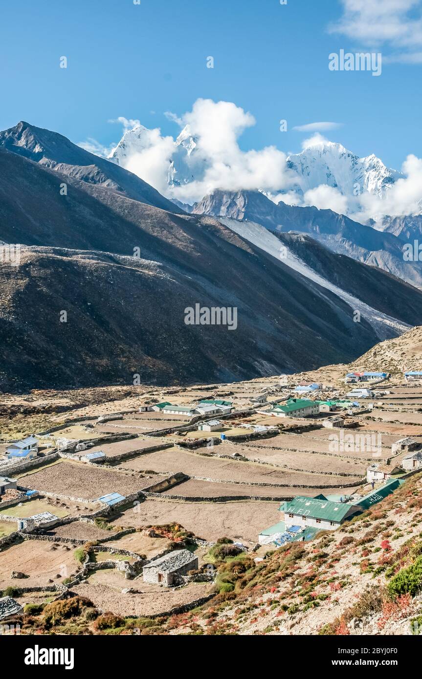 Nepal. Island Peak Trek. Looking across walled field enclosures towards ...