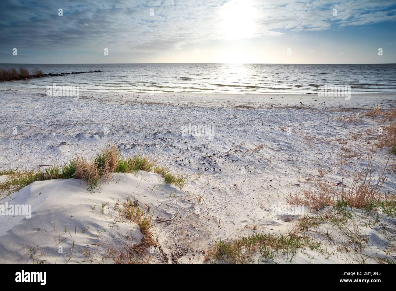 sunshine over sand beach and North sea Stock Photo - Alamy