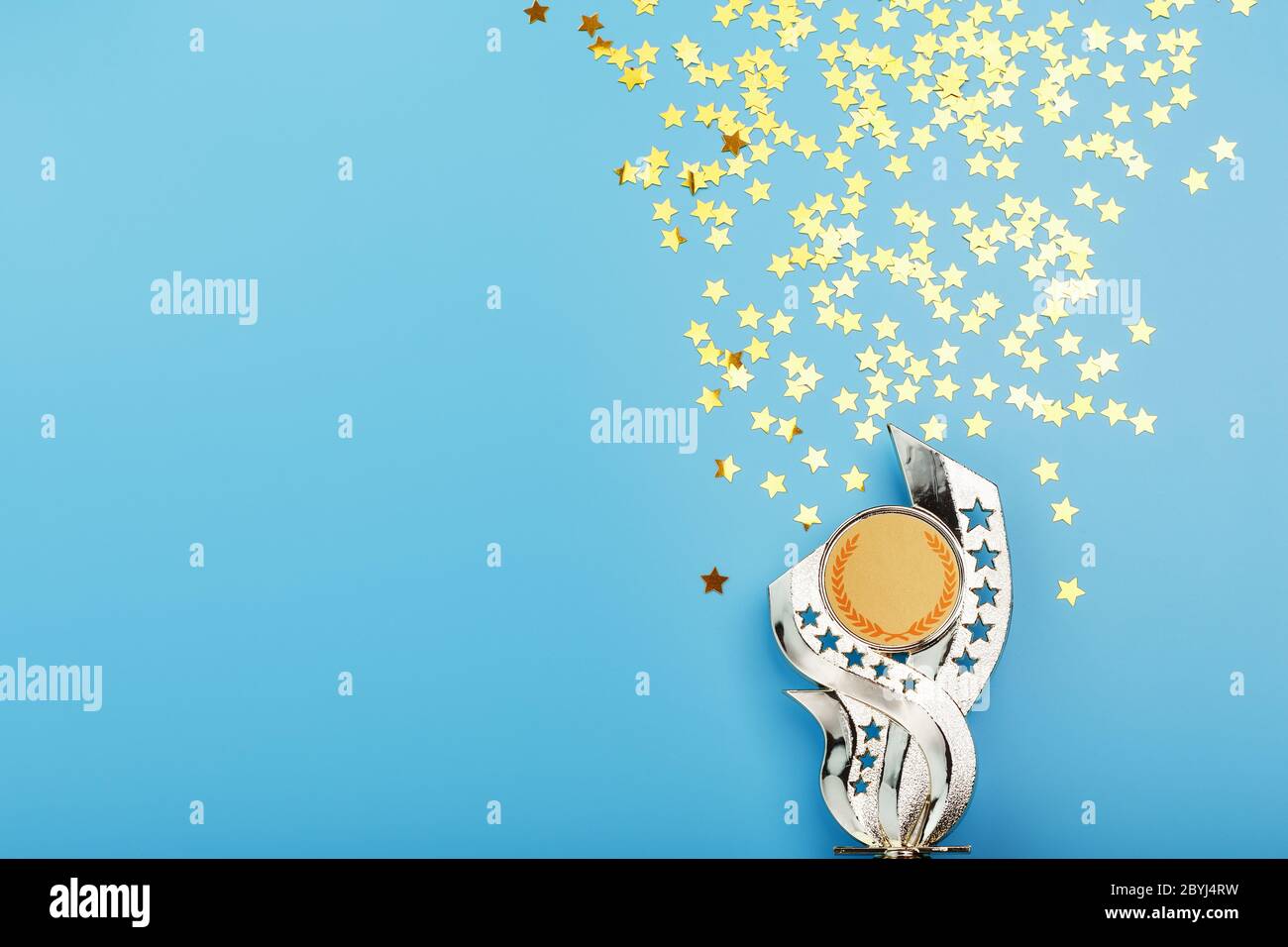 Superprize of gold with fireworks of stars on a blue background Stock ...