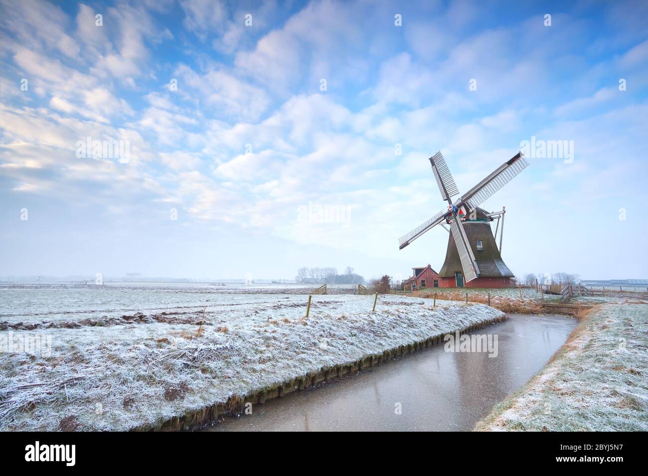 Dutch windmill in winter Stock Photo - Alamy