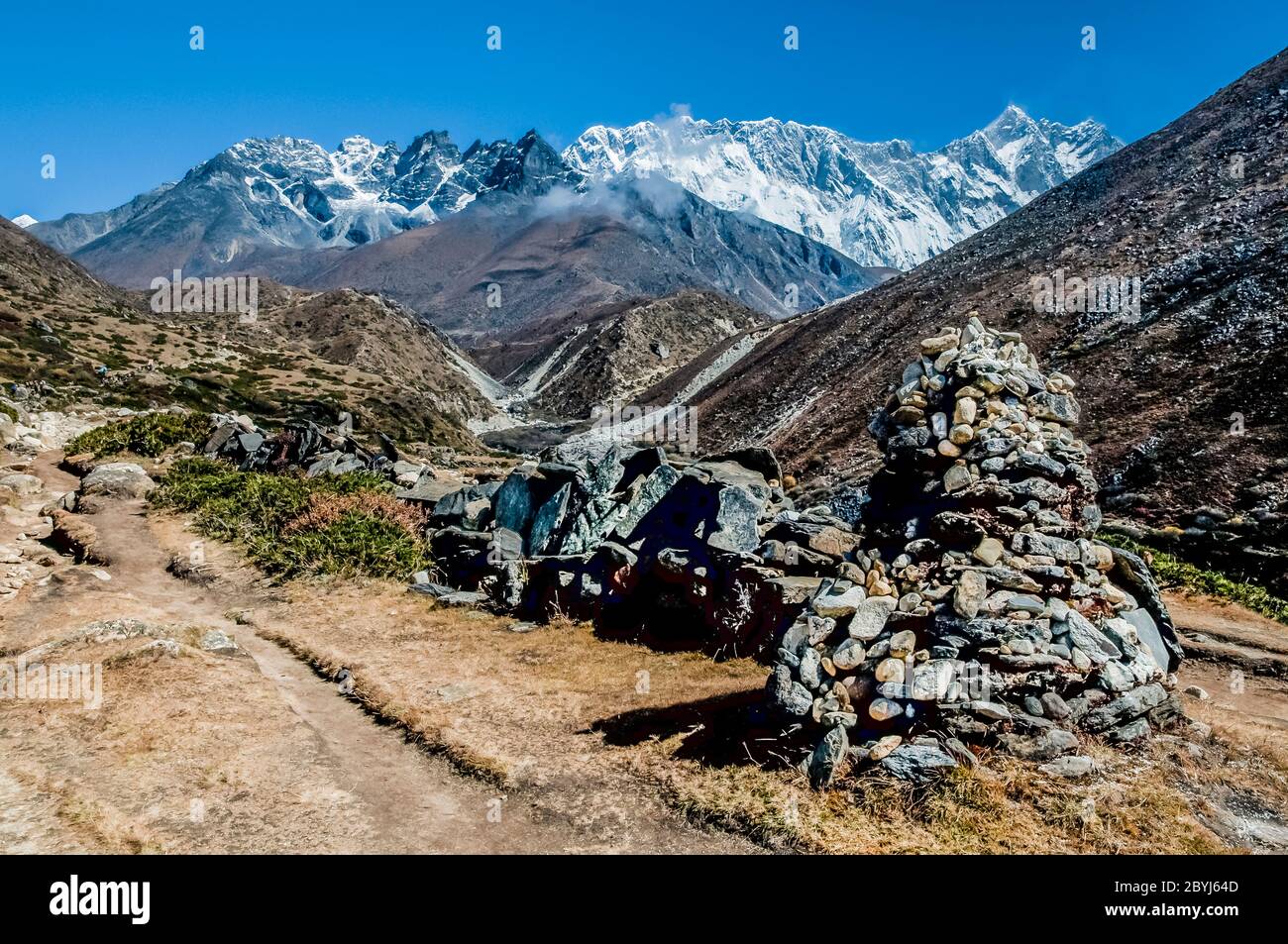 Nepal.Island Peak Trek. Buddhist mani stone prayer wall with the ...