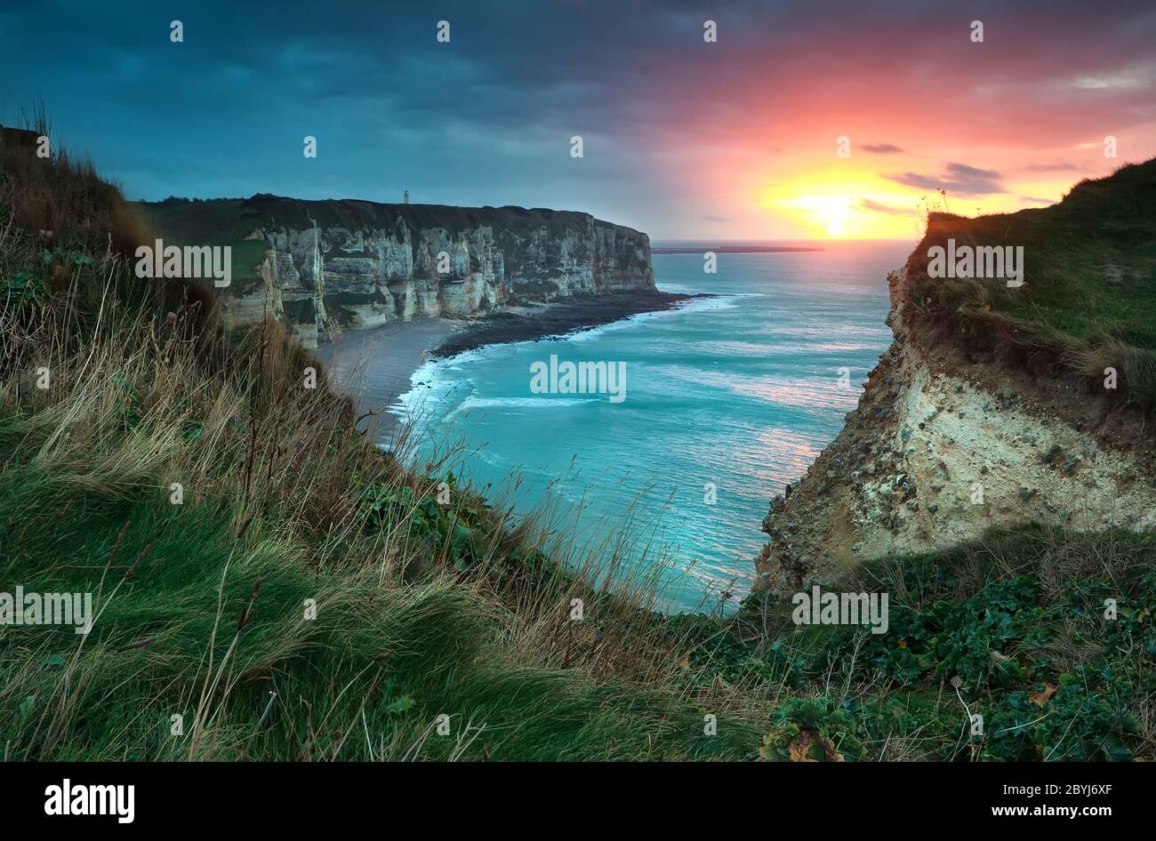 warm sunset over cliffs and ocean Stock Photo - Alamy