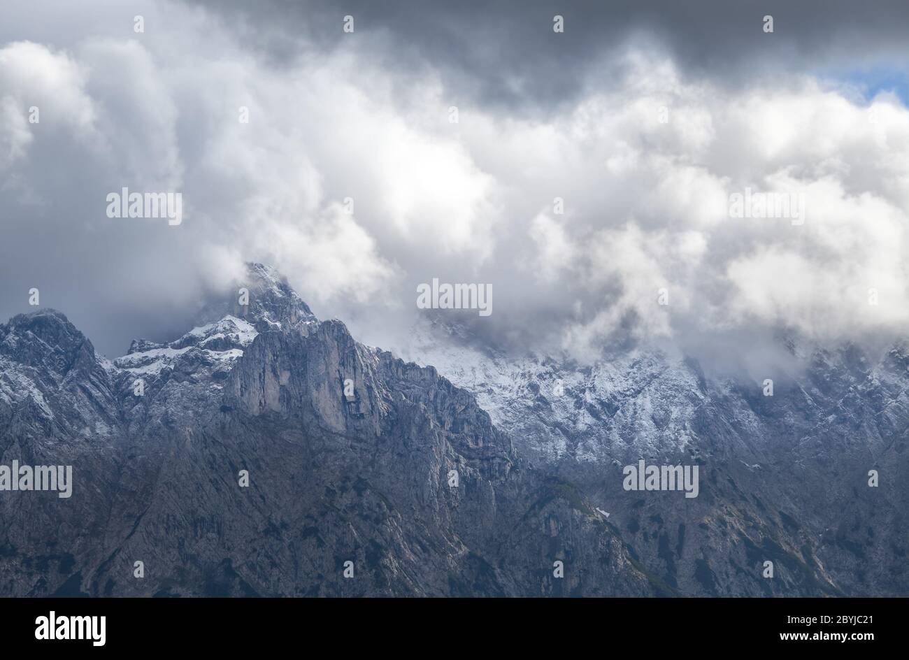 clouds over mountain peaks Stock Photo - Alamy