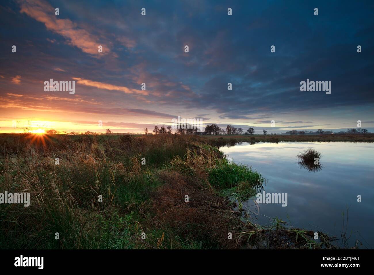 sunrise over river Stock Photo - Alamy