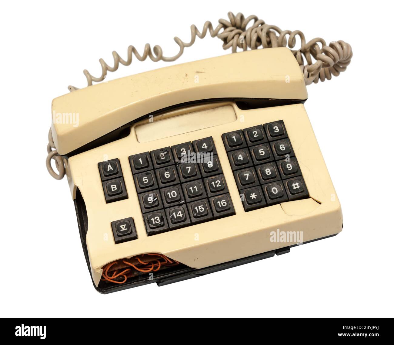 Telephone collection - crashed phone on white back Stock Photo - Alamy