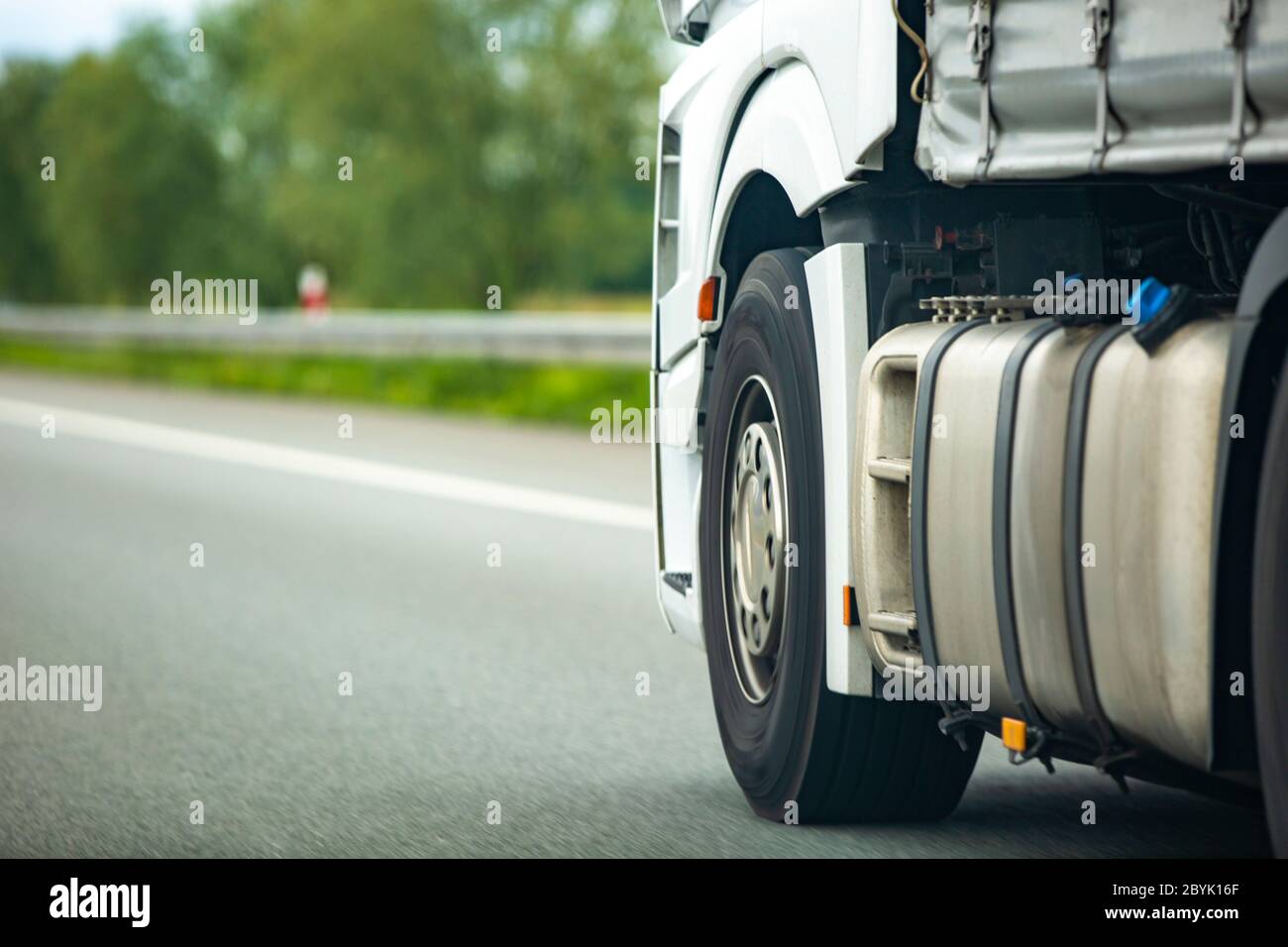 Long vehicle truck with a trailer on a highway, motion blur effect ...