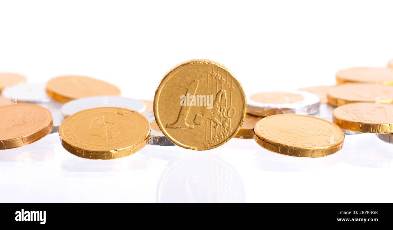 Milk chocolate gold coins hi-res stock photography and images - Alamy