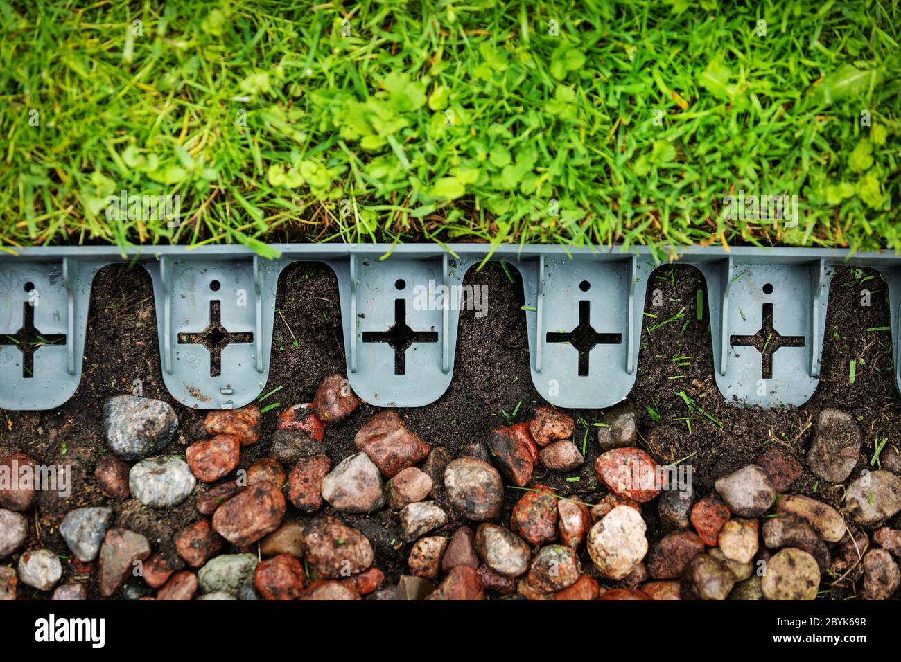 plastic garden lawn border. top view Stock Photo - Alamy