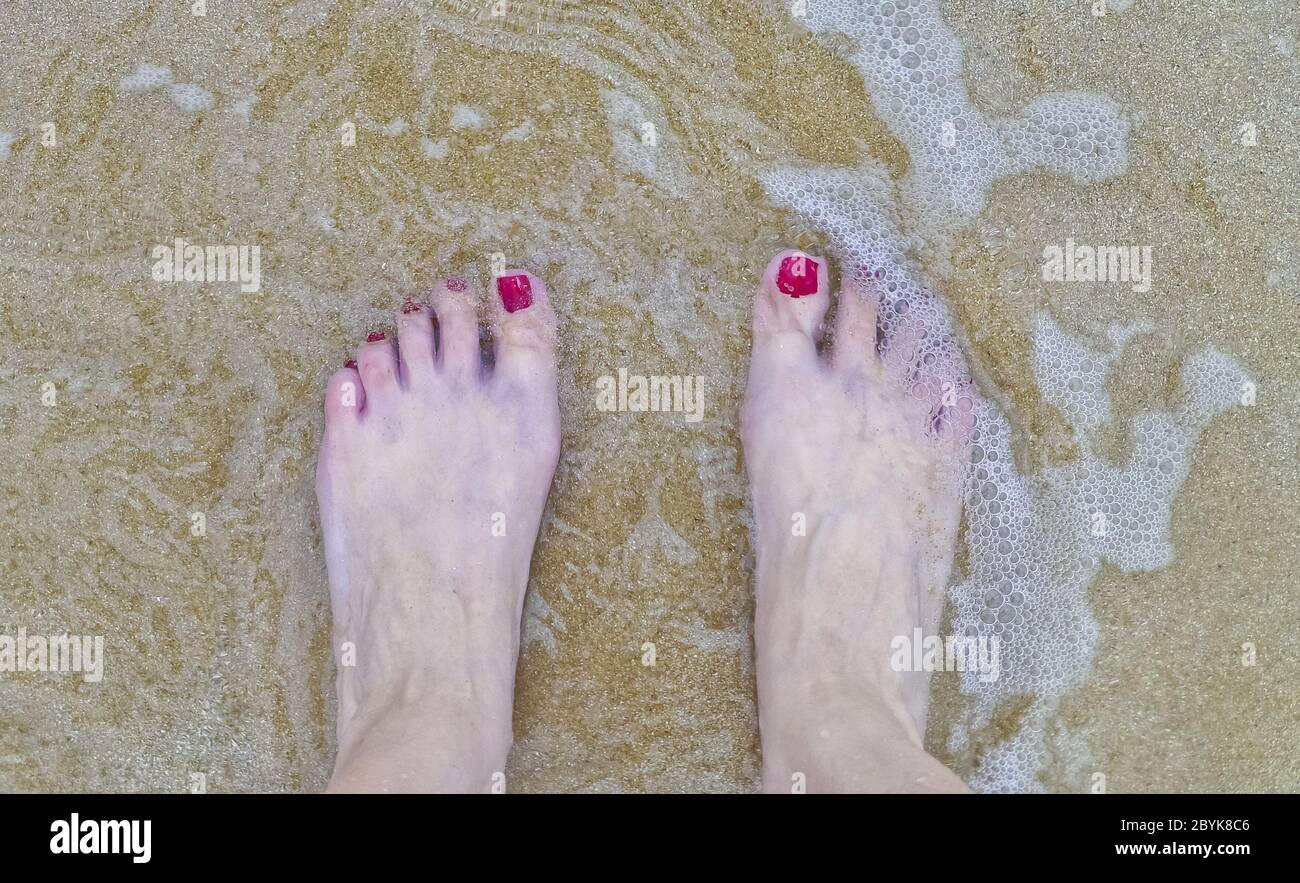 Toes red nail polish in hi-res stock photography and images - Alamy