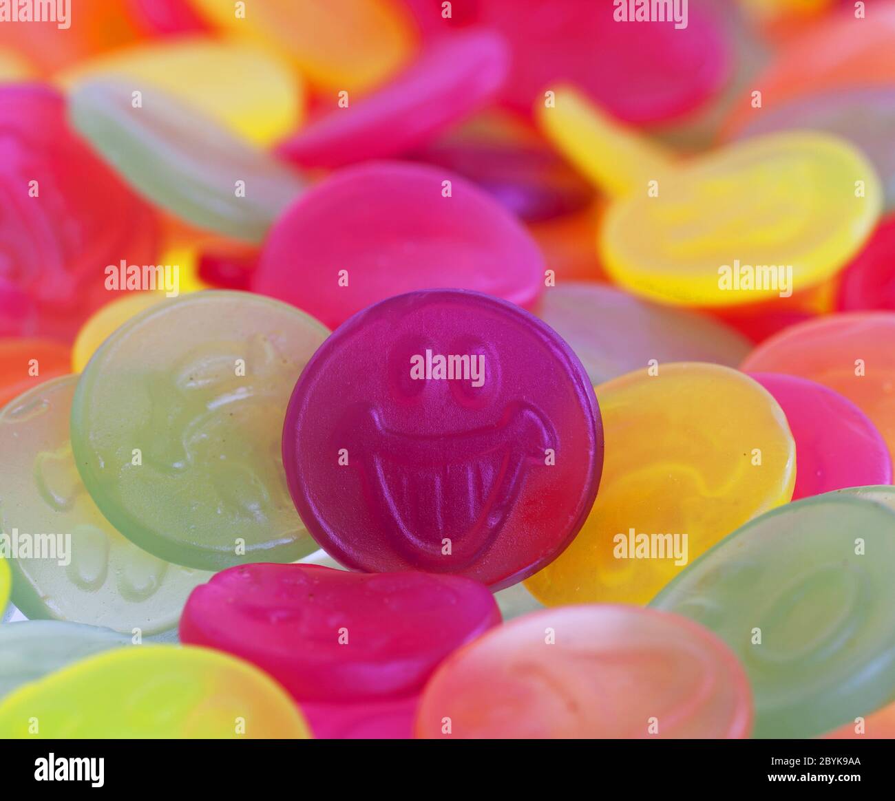 Colorful candy faces Stock Photo - Alamy