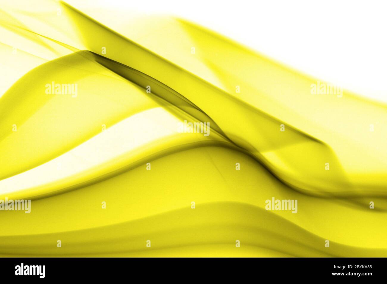 Yellow abstract smoke on white background - macro photo Stock Photo - Alamy
