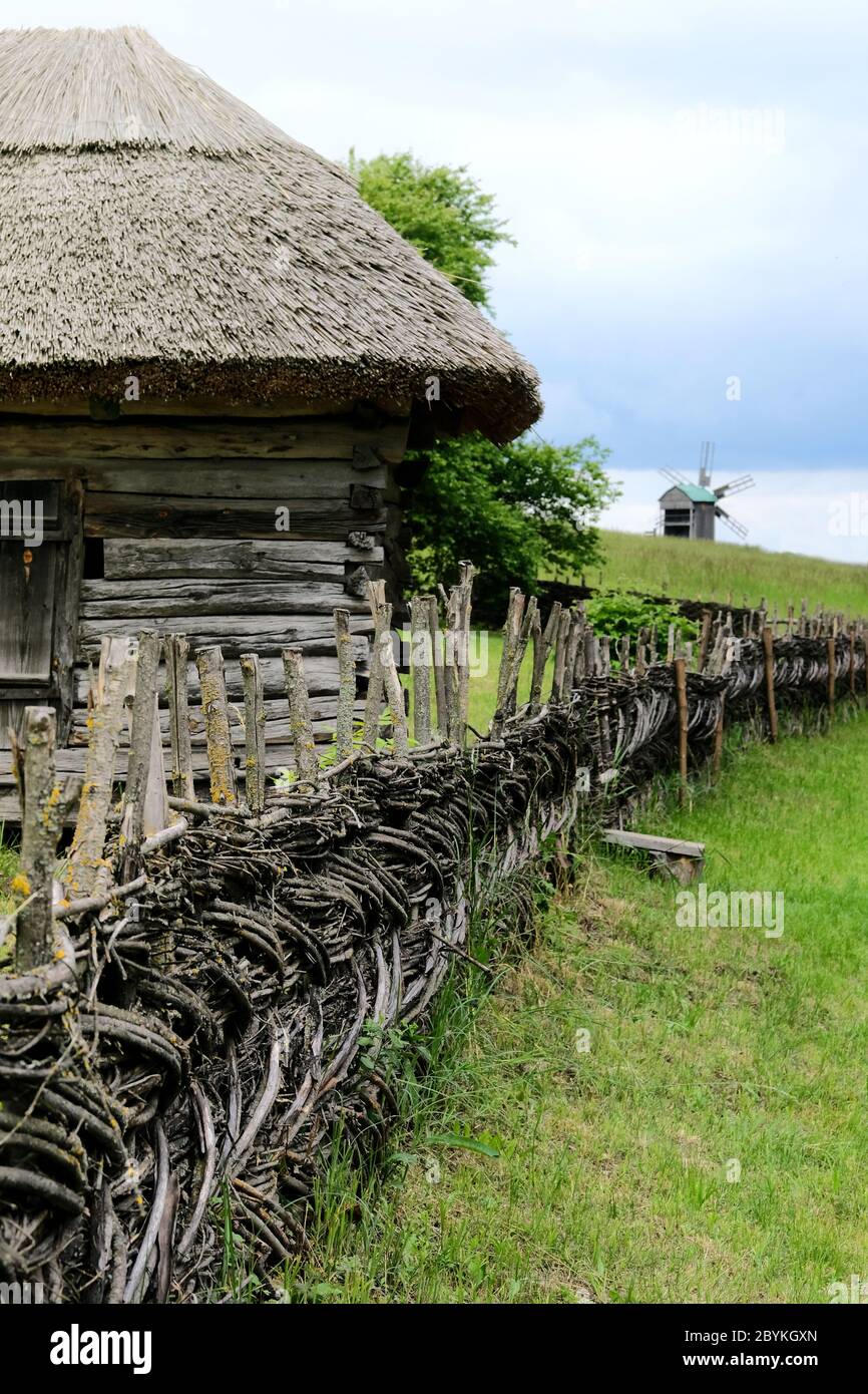 Wooden rural fence in village near the house near the forest. Authentic ...