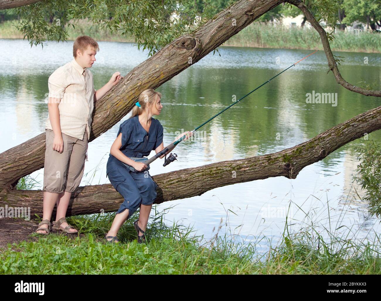 Young people fishing hi-res stock photography and images - Alamy