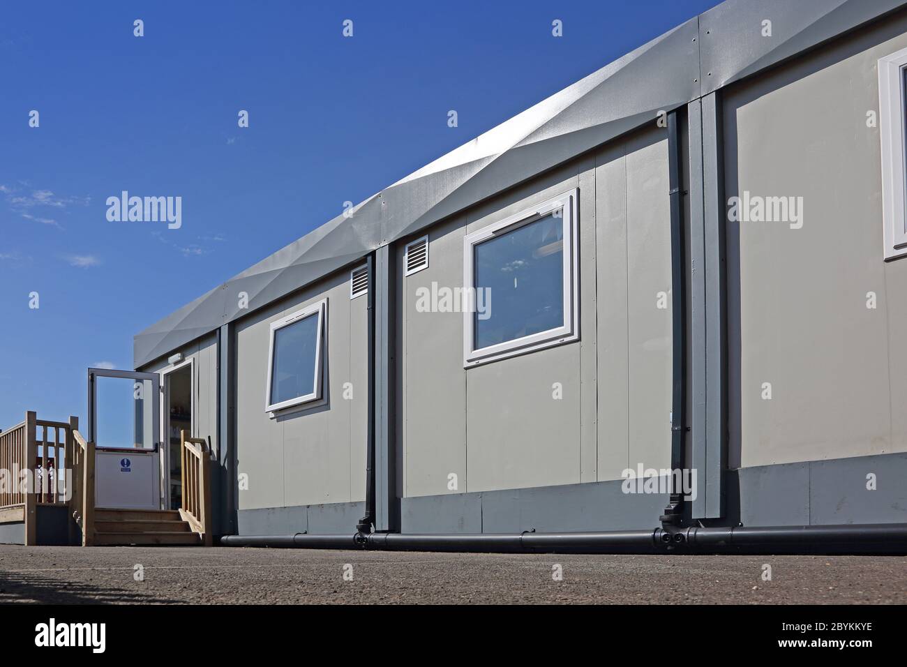 Temporary classrooms erected in the playground of a London junior ...