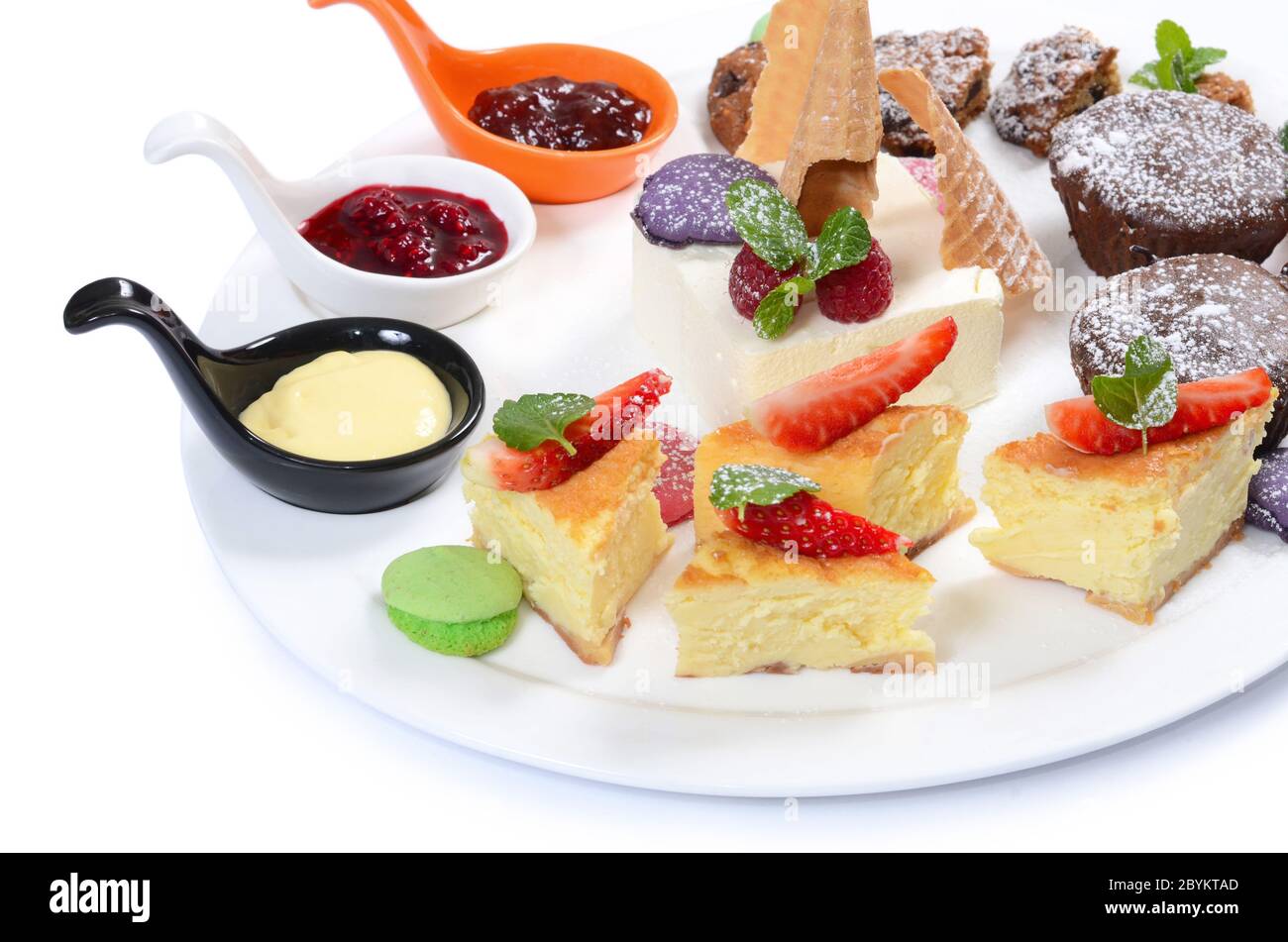 Plate of different desserts isolated Stock Photo - Alamy