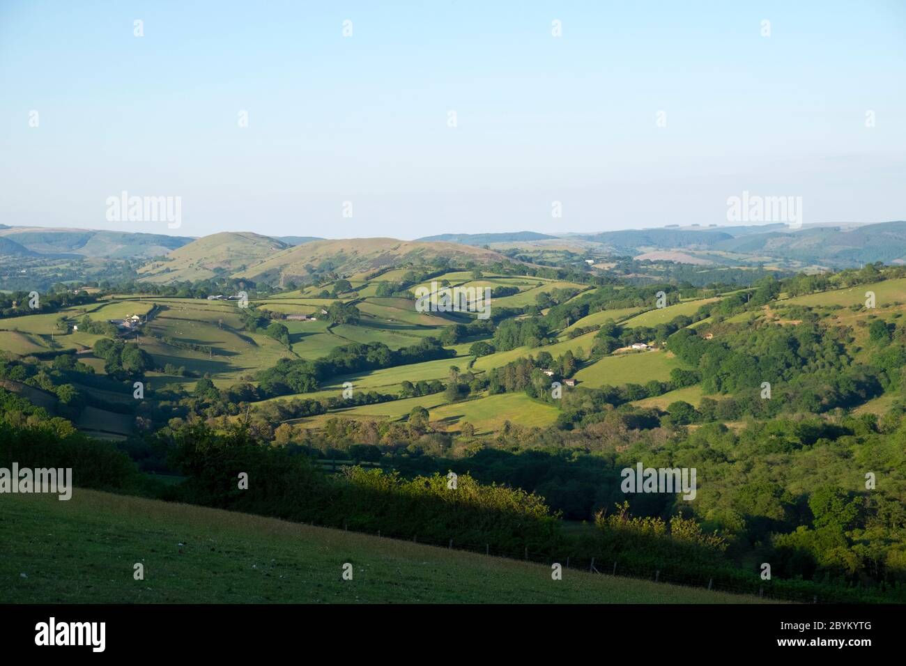 View of hill farms in Welsh countryside landscape hills and fields near ...