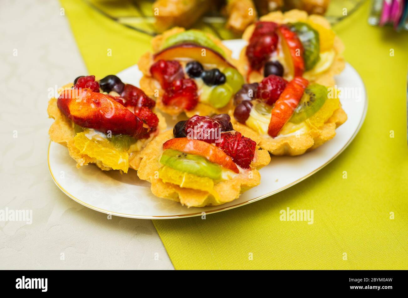 Tasty sweets in the plate Stock Photo - Alamy
