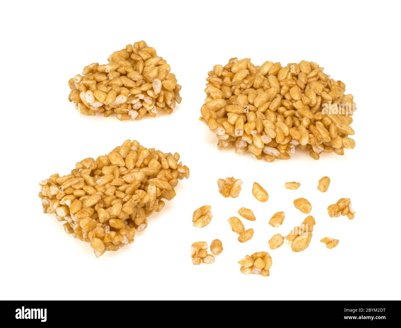pressed sweet puffed rice on white background Stock Photo - Alamy