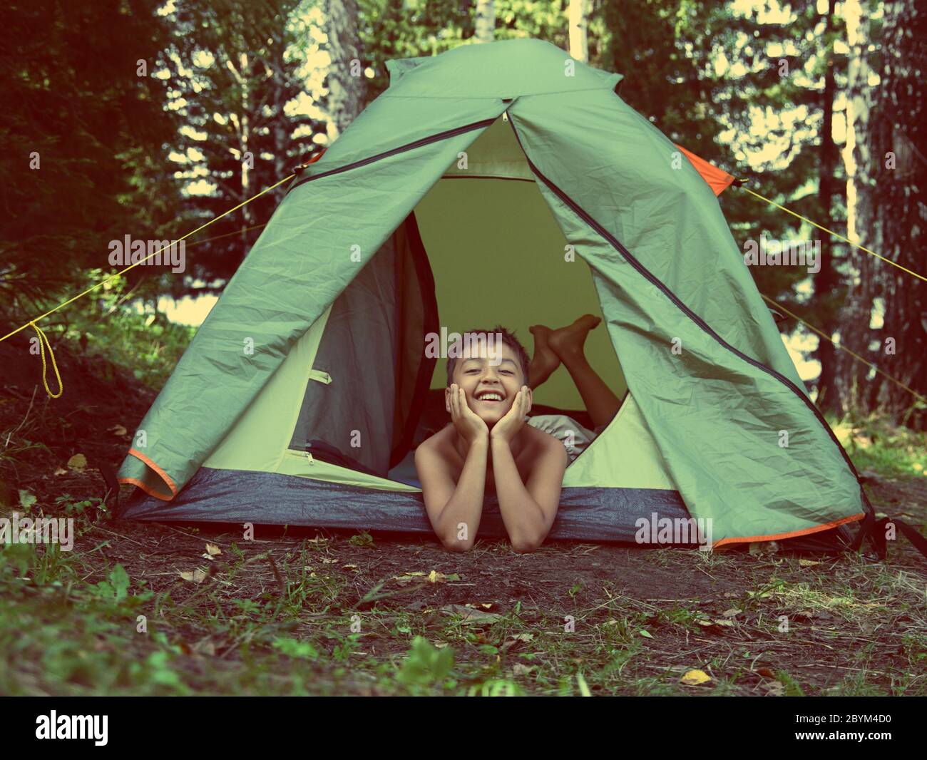 Happy child tent camping hi-res stock photography and images - Alamy