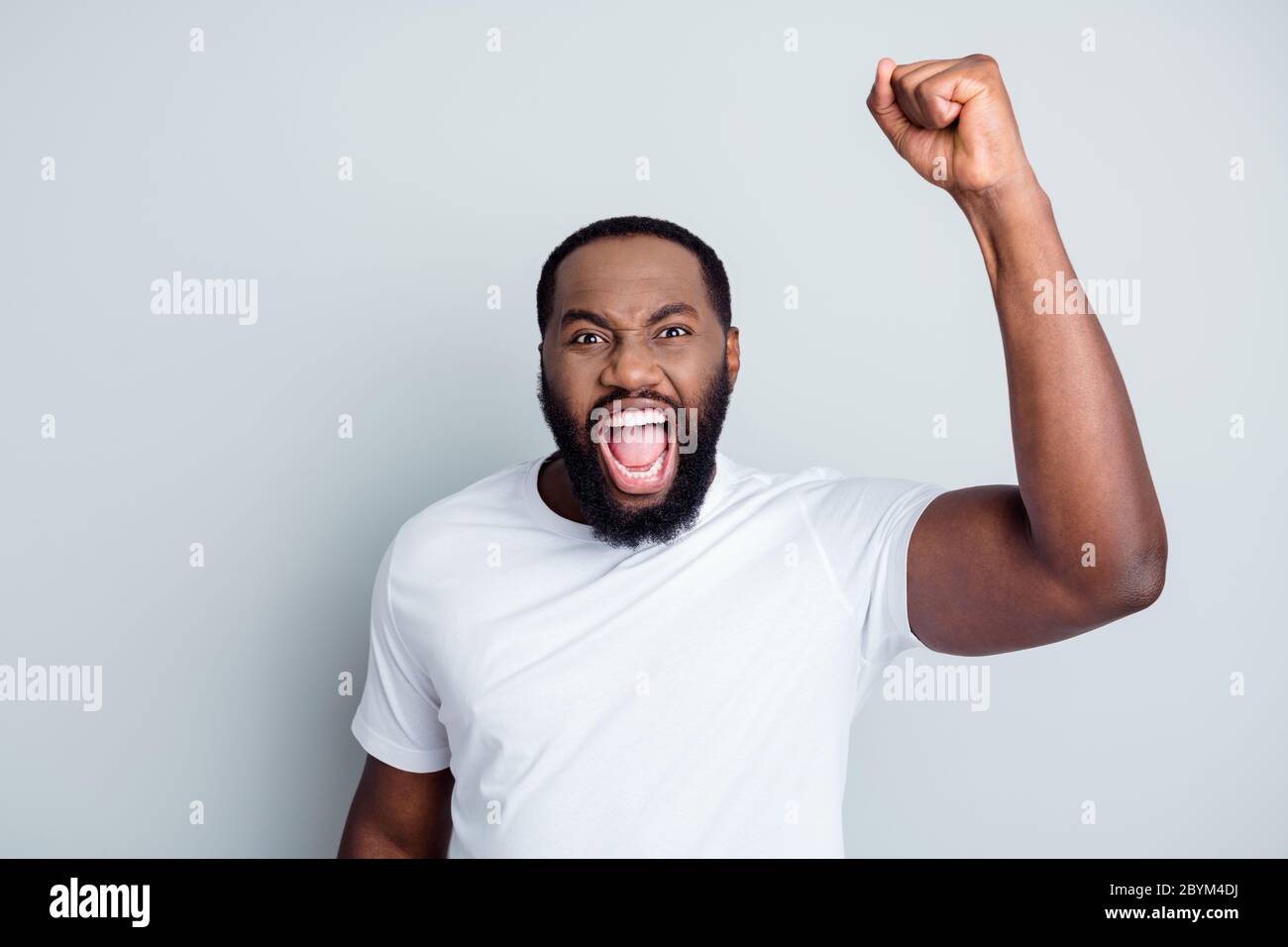 Photo of rage mad outraged dark skin african guy protester community ...