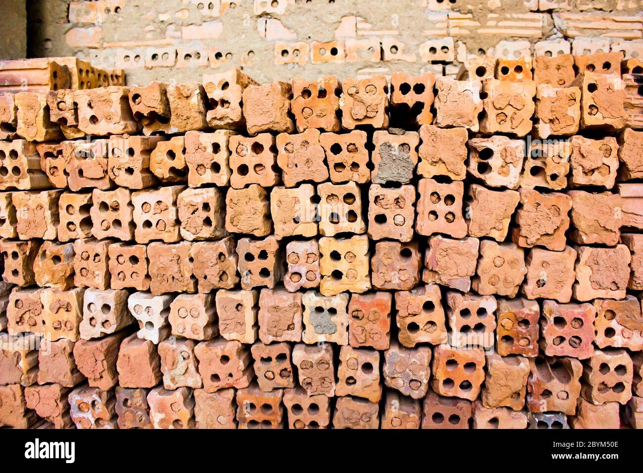 brick kiln. collection set of red bricks stack in oven factory before ...